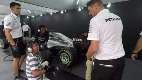Formula 1 Pit Stop Stock Footage ~ Royalty Free Stock Videos | Pond5