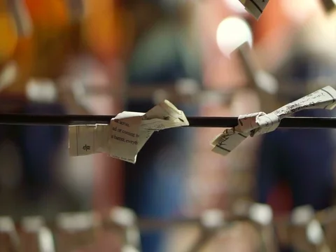 Fortune paper left knot at Shinto temple... | Stock Video | Pond5