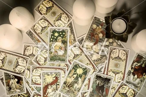 Fortune telling rite with occult and esoteric symbols. Tarot cards ...