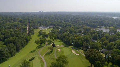 Forward Aerial Pan of a Golf Course Near... | Stock Video | Pond5