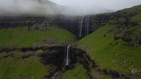 Fossá Waterfall with power line over ri... | Stock Video | Pond5