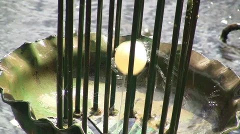 Fountain shoots ping pong ball into air,... | Stock Video | Pond5