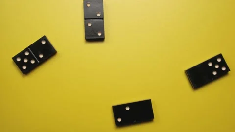 Four domino chips joining in a sequence ... | Stock Video | Pond5