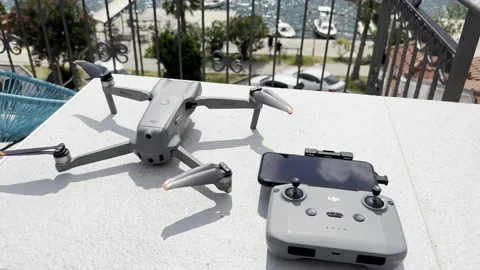 Four-engine drone next to the control pa... | Stock Video | Pond5