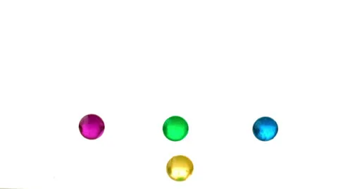 Four marbles falling and bouncing | Stock Video | Pond5