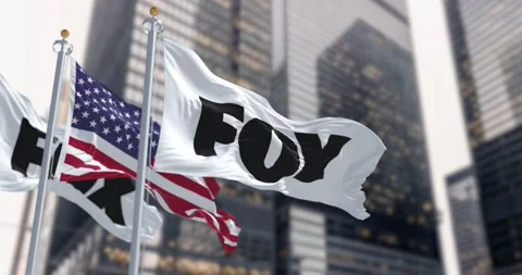 Fox and US national flags waving in a fi... | Stock Video | Pond5