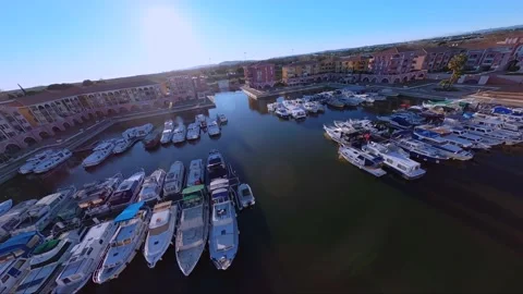 Fpv diving shot revealing a full port Ar... | Stock Video | Pond5