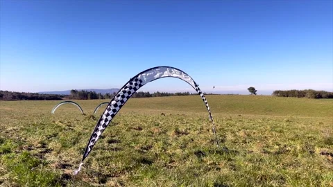 FPV Drone Race. Outdoor Gate Arches On T... | Stock Video | Pond5