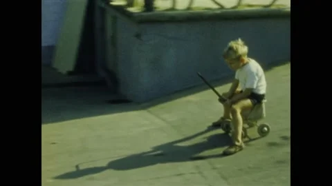 France 1959, children play in the yard | Stock Video | Pond5