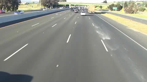 Freeway driving ,big rig, tilt up, eleva... | Stock Video | Pond5