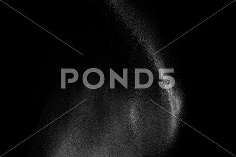 Freeze motion of white particles on black background. ~ Hi Res #78128638