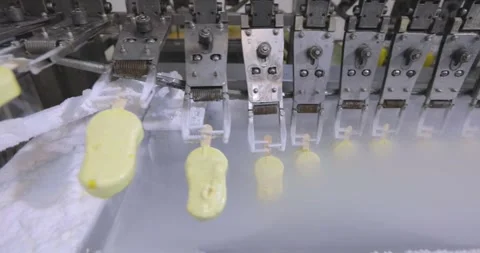 Freezing ice cream on the conveyor. Ice ... | Stock Video | Pond5