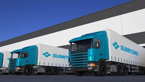 Freight semi trucks with Sumitomo Corpor... | Stock Video | Pond5