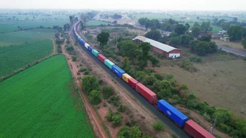 Freight train with blue, yellow, red and... | Stock Video | Pond5