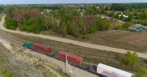 Freight train with containers near the b... | Stock Video | Pond5