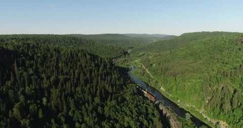 Freight train with multicolored carriage... | Stock Video | Pond5