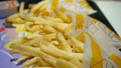 French fries, fast food. Lots of French ... | Stock Video | Pond5