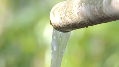 fresh clean drinking water flowing out f... | Stock Video | Pond5