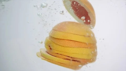 Fresh fruit in water splash, falling gra... | Stock Video | Pond5