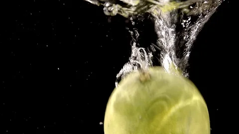 Fresh Lemon falling into water in slow m... | Stock Video | Pond5