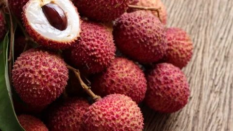 Fresh ripe lychee fruit and peeled lyche... | Stock Video | Pond5