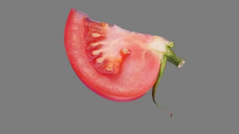 Fresh tomato slice spin and float, seaml... | Stock Video | Pond5