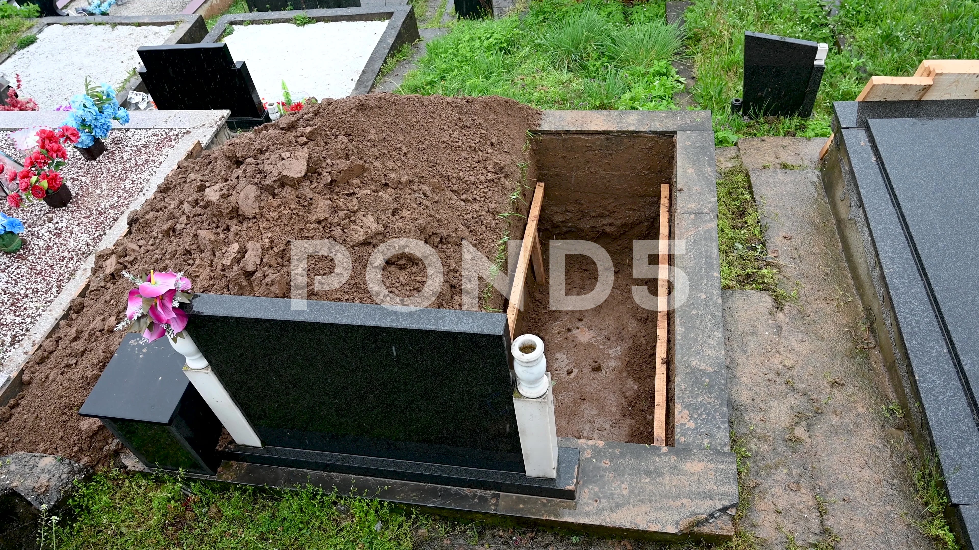 Fresh Dug Grave At Funeral