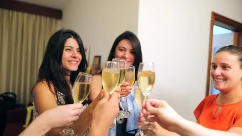 Friends cheering with champagne glasses.... | Stock Video | Pond5