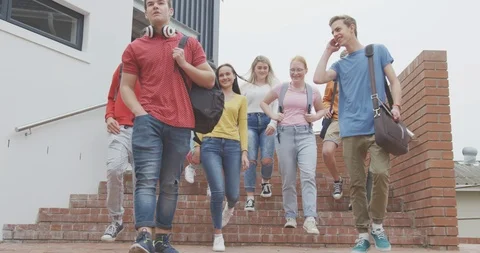 Friends going outside at the end of the ... | Stock Video | Pond5