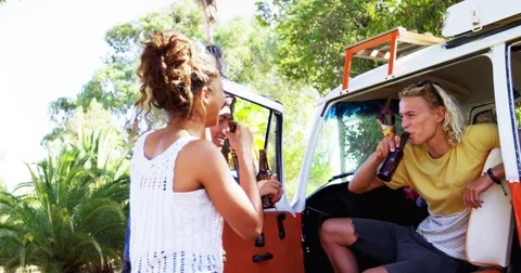 Friends having fun in camper van 4k | Stock Video | Pond5