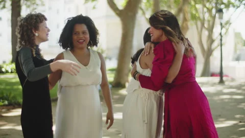 Friends hugging with brides in park afte... | Stock Video | Pond5
