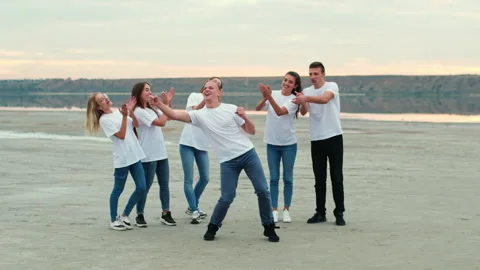 Friends team dance and clap having fun o... | Stock Video | Pond5