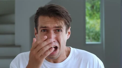 Frightened man screams in panic, seeing ... | Stock Video | Pond5