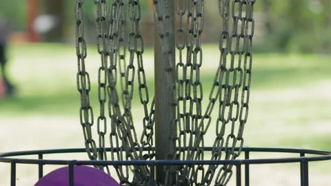 Frisbee Hitting the Metal Chain Basket o... | Stock Video | Pond5