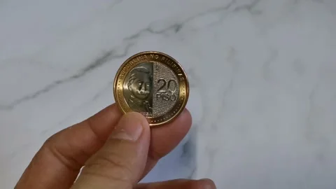 Front and Back of 20 Peso Coins Philippi... | Stock Video | Pond5