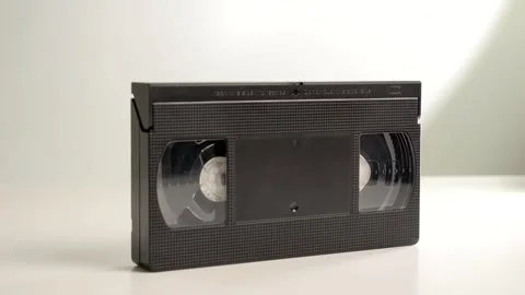 The front of a black old VHS cassette wi... | Stock Video | Pond5