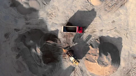 Front end loader load sand and gravel in... | Stock Video | Pond5