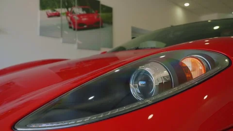 Front lamp of red sport car goes on and ... | Stock Video | Pond5