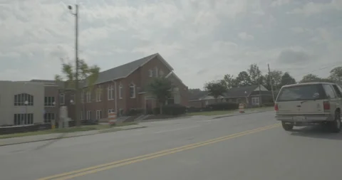 Front left driving plate - Main Street a... | Stock Video | Pond5