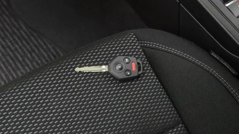 Front seat in car interior with keys clo... | Stock Video | Pond5