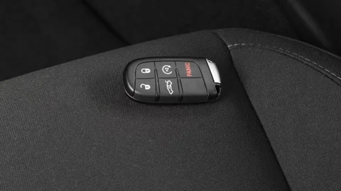 Front seat in car interior with keys clo... | Stock Video | Pond5