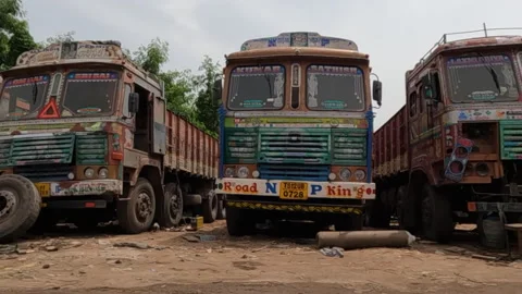 Front side view of Indian trucks in a ro... | Stock Video | Pond5