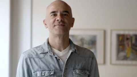 Front view of handsome serious bald man ... | Stock Video | Pond5