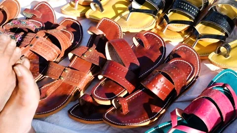 Front view of an Indian cobbler selling ... | Stock Video | Pond5