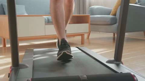 Front View Of Legs Of Man Running On A T... | Stock Video | Pond5