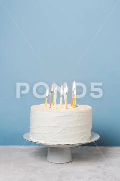 Front view lit candles birthday cake High resolution photo ~ Premium ...