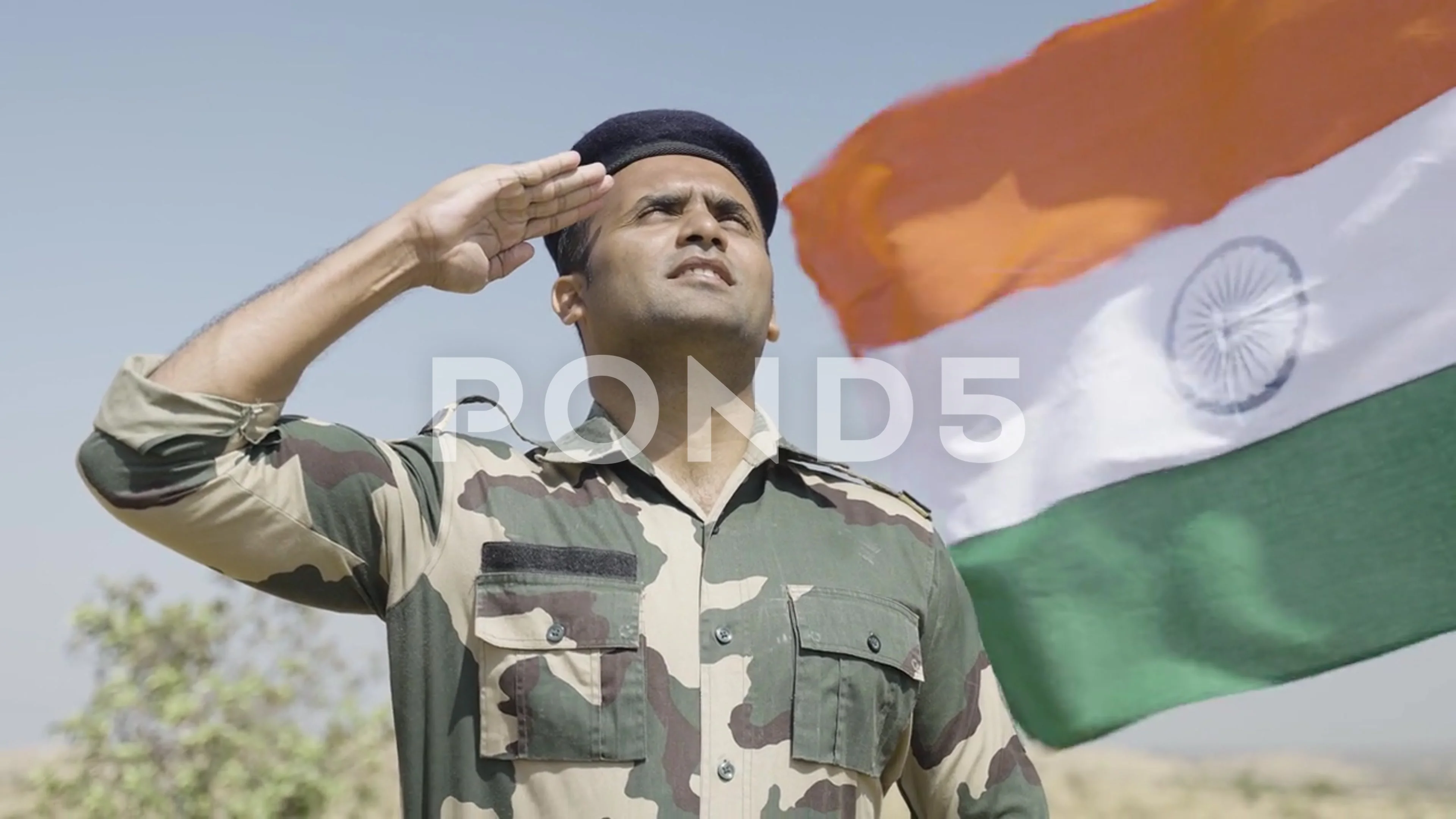 Army Soldier Saluting Flag