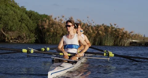 Front view of male rower team rowing on ... | Stock Video | Pond5