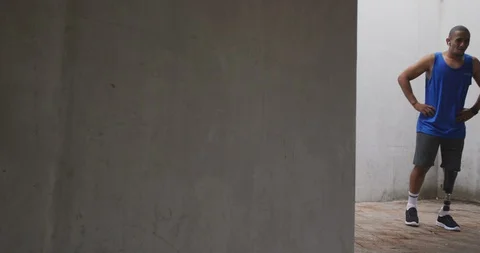 Front view man with prosthetic leg resti... | Stock Video | Pond5
