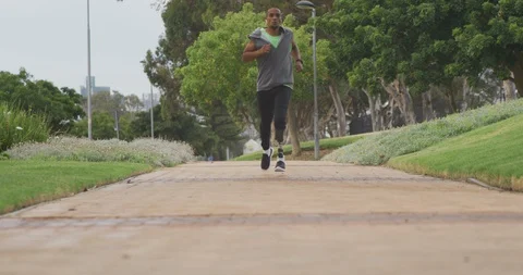 Front view man with prosthetic leg runni... | Stock Video | Pond5